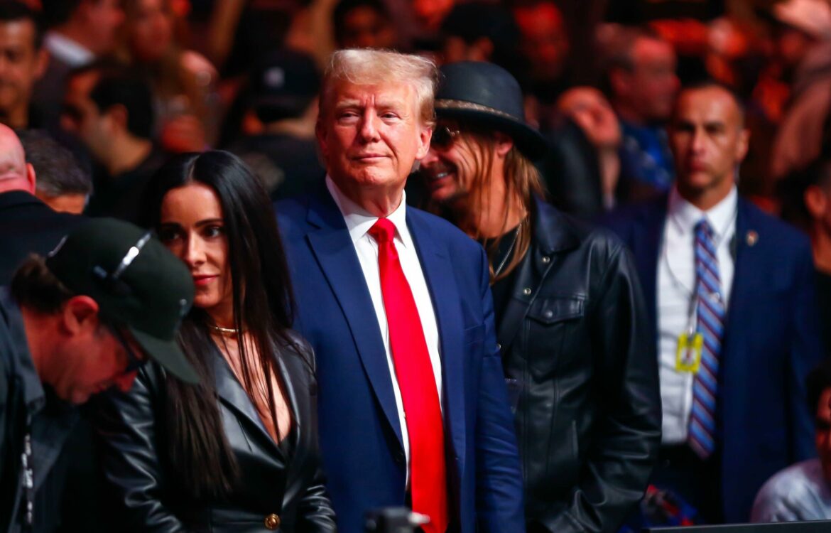 Trump makes history with epic UFC walkout and all-star entourage
